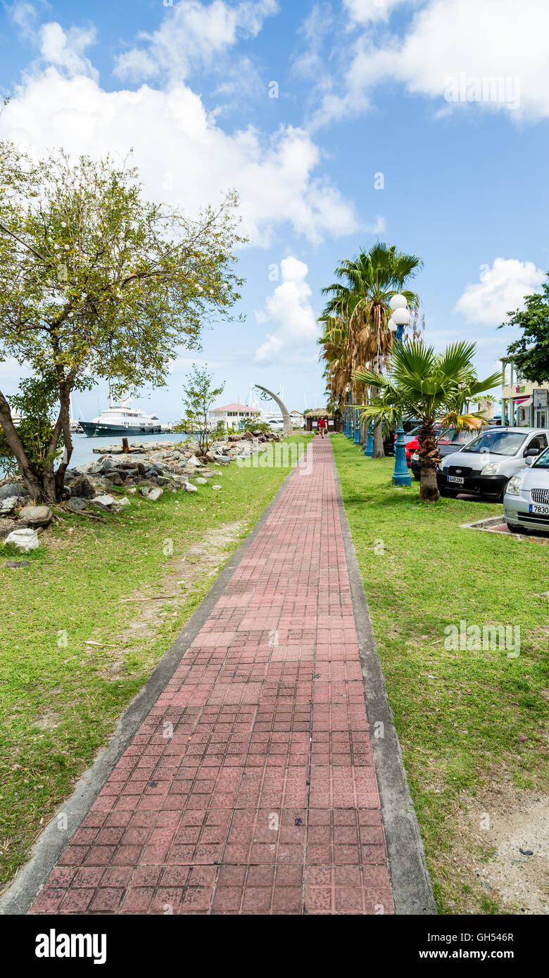 Brick Walkway Along St Martin Harbor and docks Stock Photo - Alamy