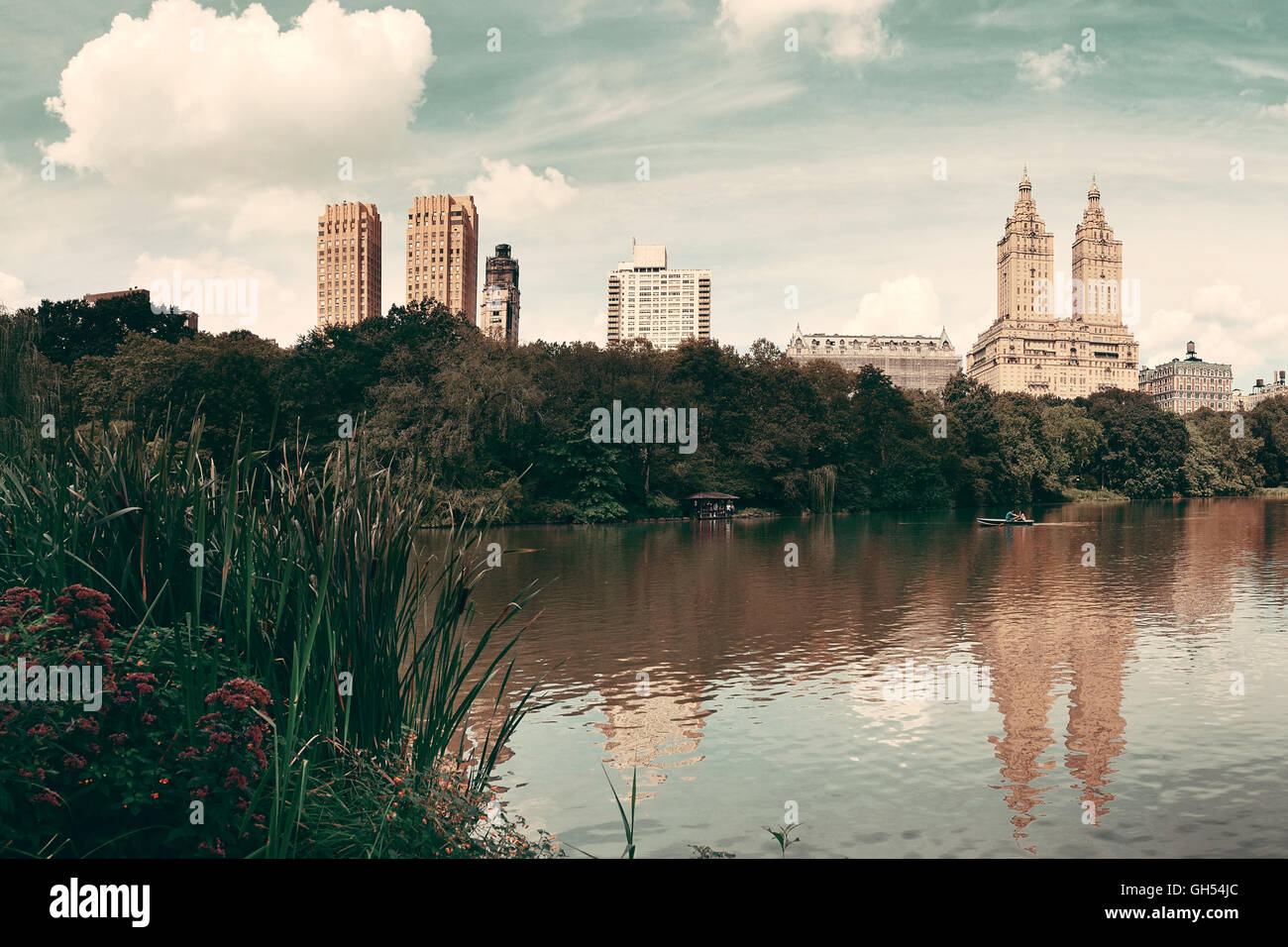 Central Park Spring with skyline panorama in midtown Manhattan New York ...