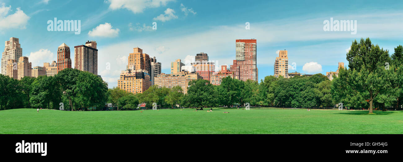 Central Park Spring with skyline in midtown Manhattan New York City ...