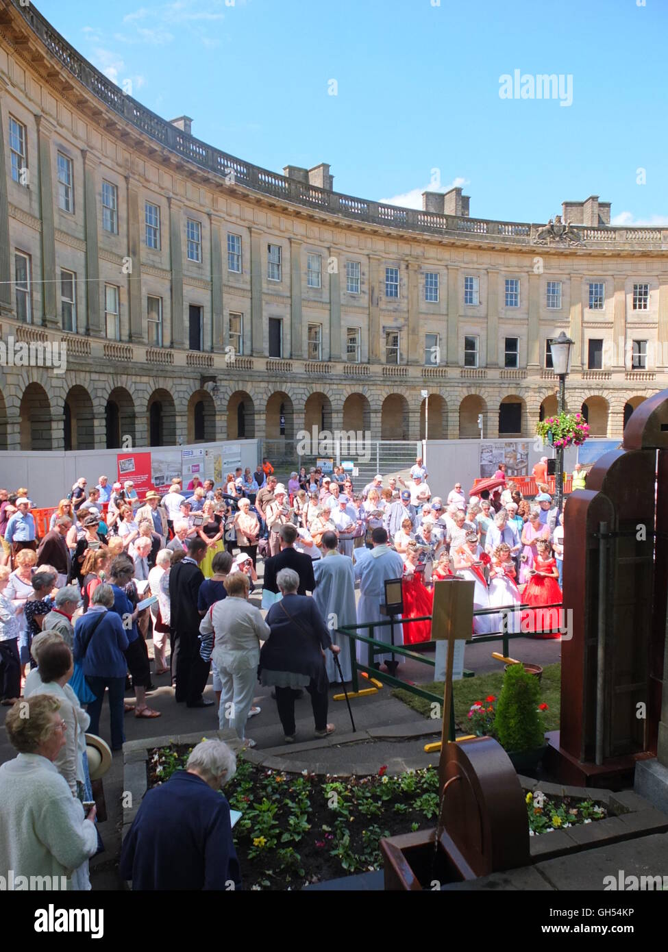 Crowds watch the well dressing at St Anns Well, Buxton being blessed ...