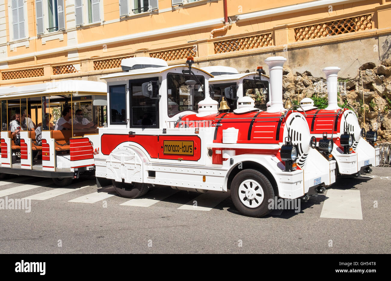 Little red & white tour trains in Monaco Stock Photo - Alamy