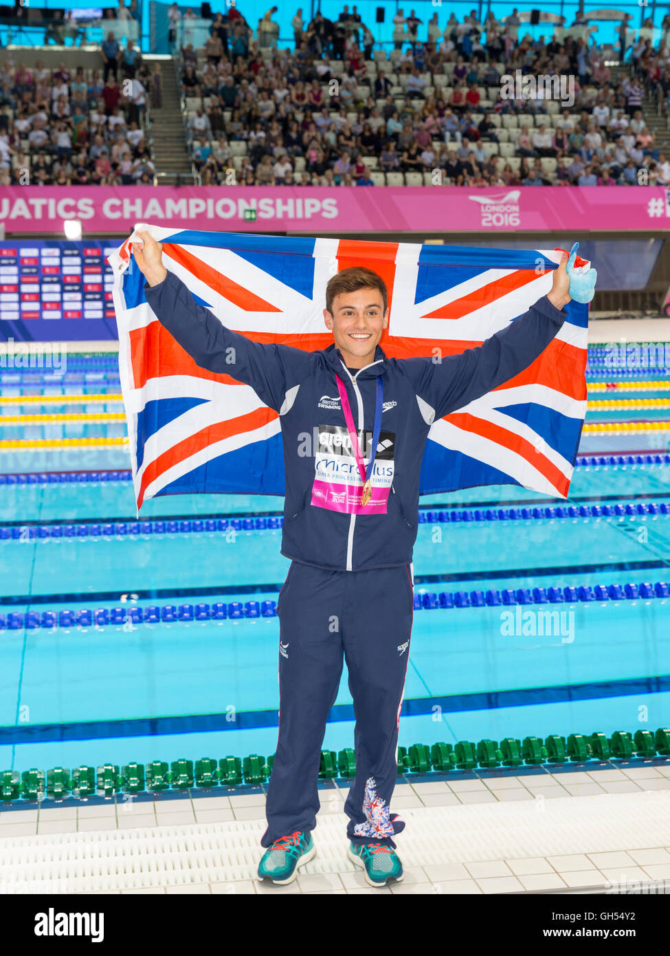 British diver Tom Daley (Thomas Daley) celebrates his medal win with ...
