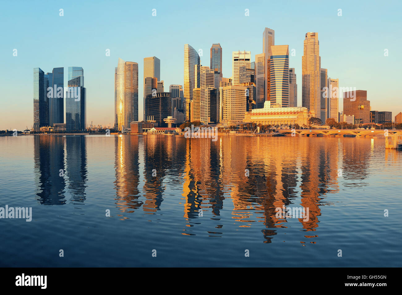 Singapore skyline with urban buildings over water Stock Photo - Alamy
