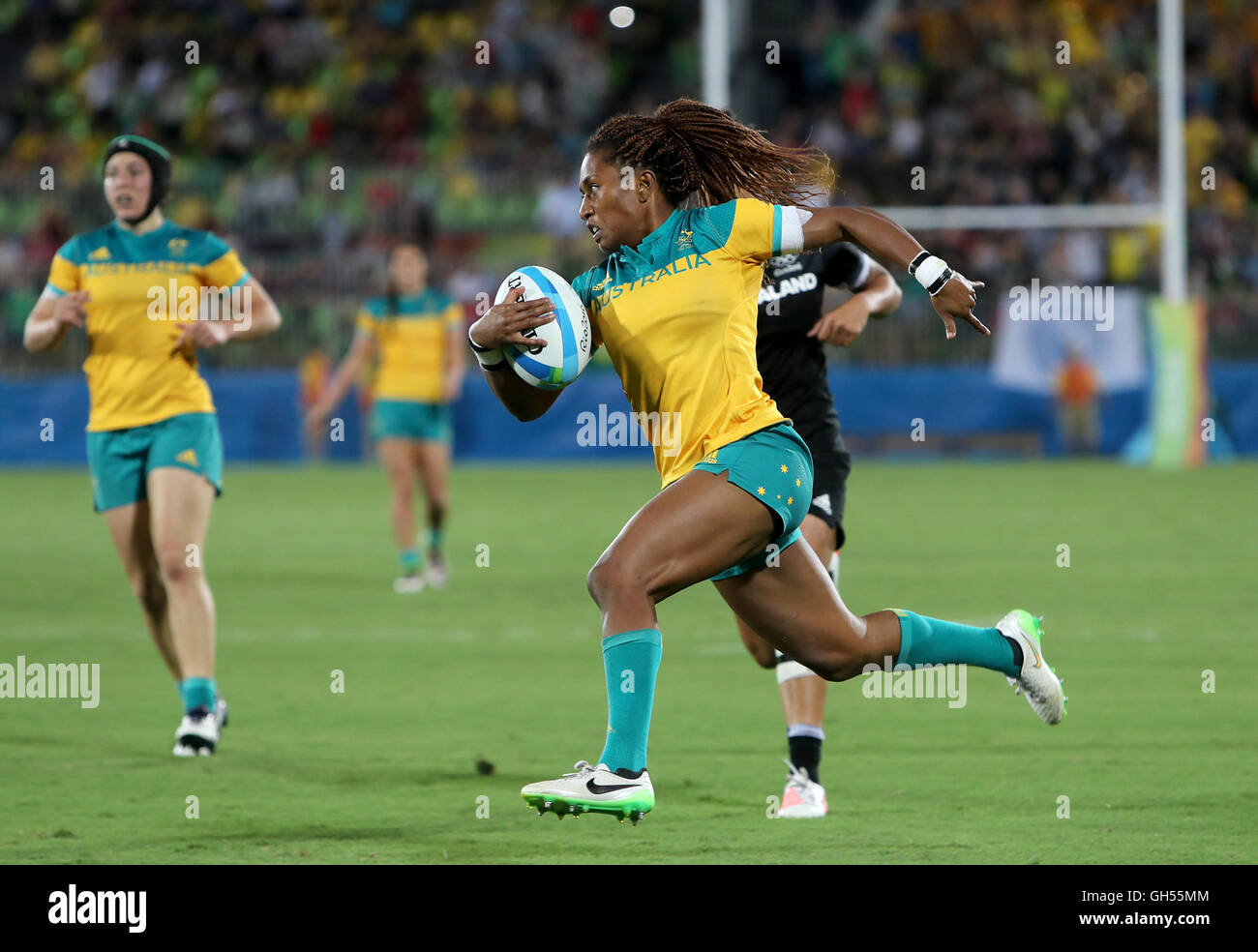 Australia's Ellia Green scores a try during the Rugby sevens gold medal ...