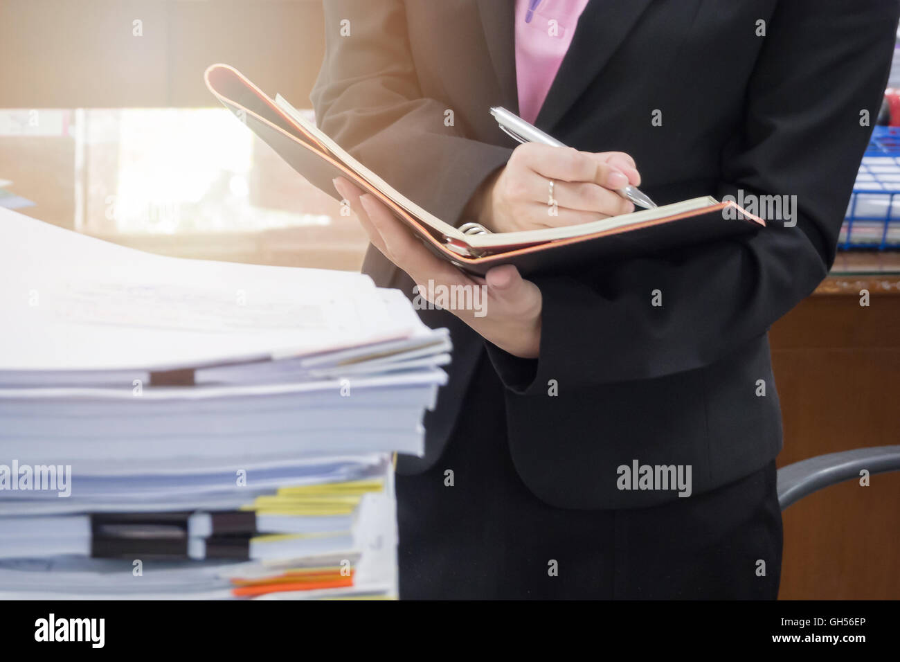 Businesswoman discussing ideas after meeting Stock Photo - Alamy
