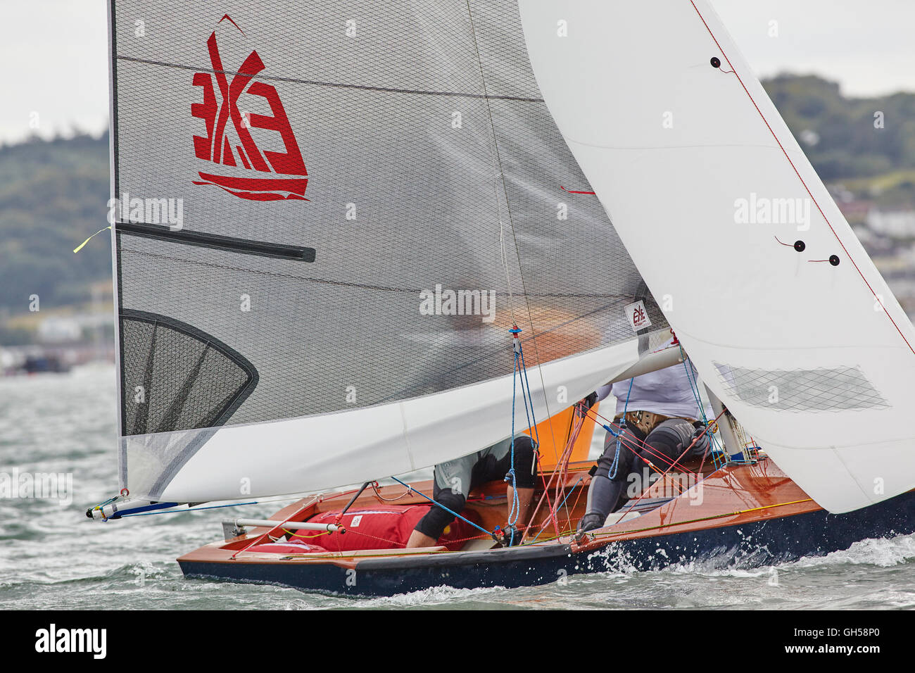Competitive sailing dinghy racing, in the estuary of the River Exe ...