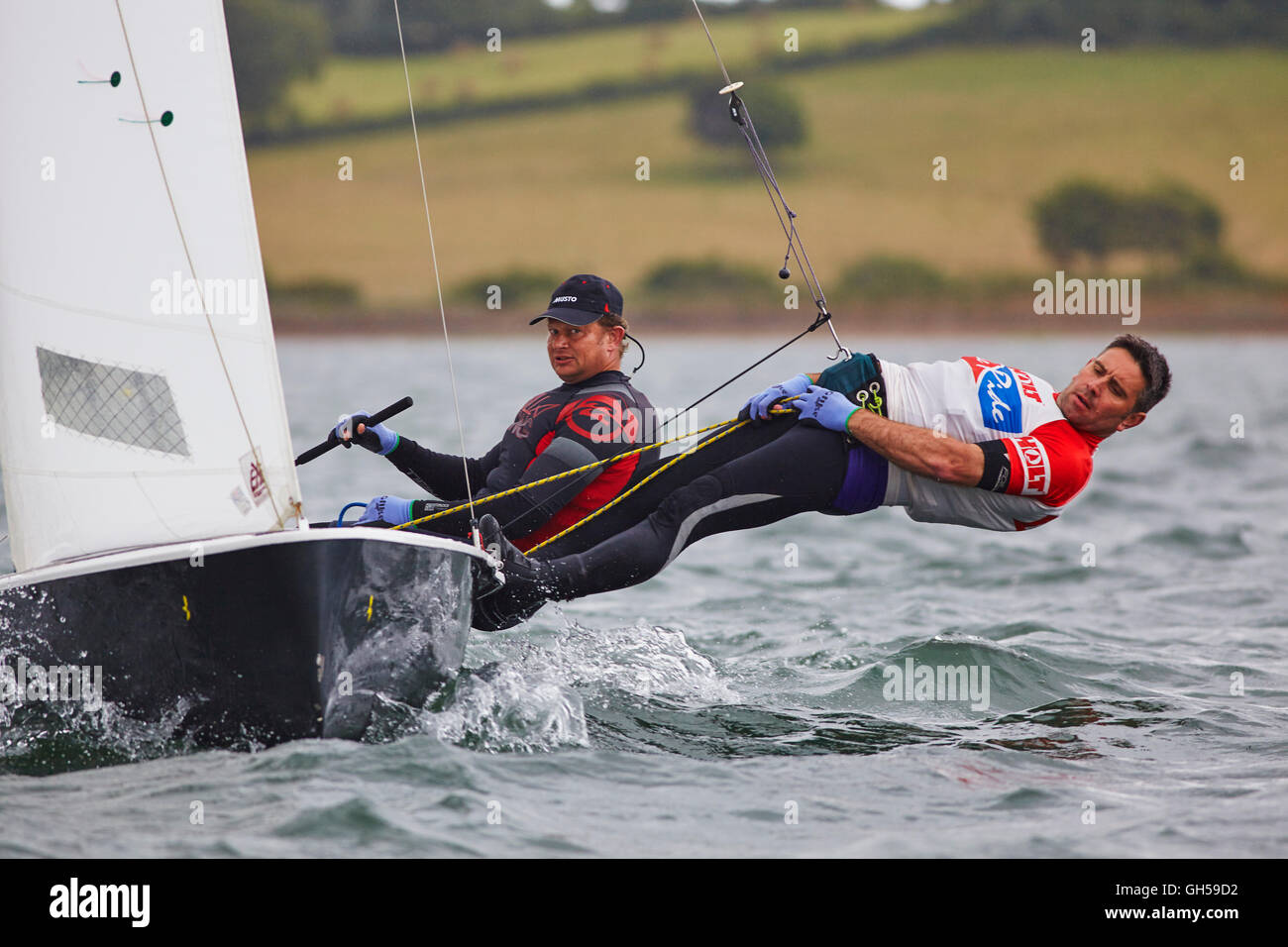 Competitive sailing dinghy racing, in the estuary of the River Exe ...