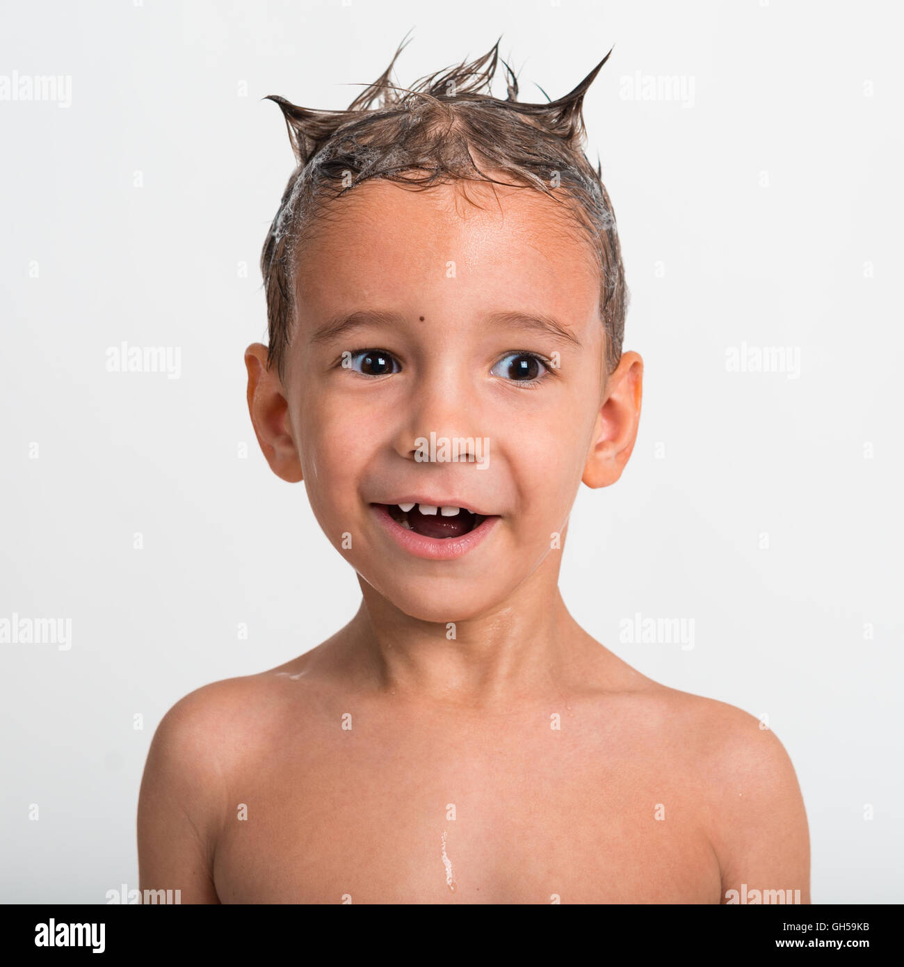 Portrait of a happy child with a lathered head Stock Photo - Alamy