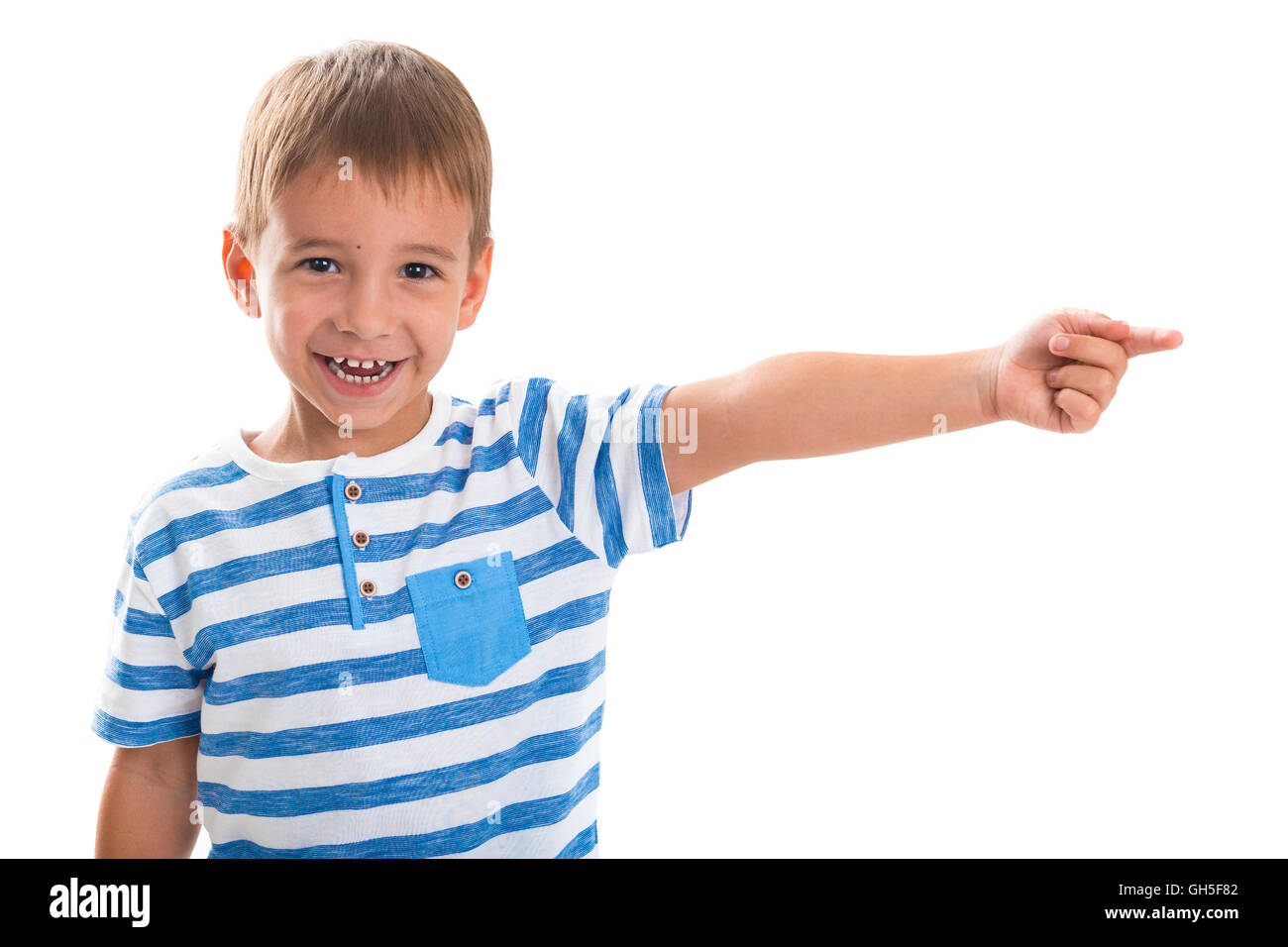 Portrait of a happy child on a white background. Smiling boy shows his ...