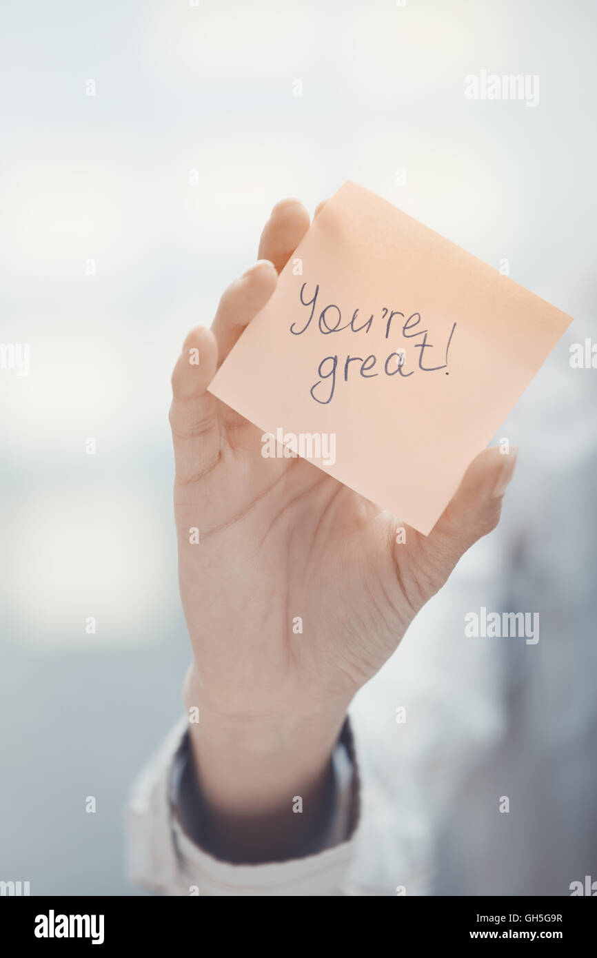 Holding sticky note hi-res stock photography and images - Alamy
