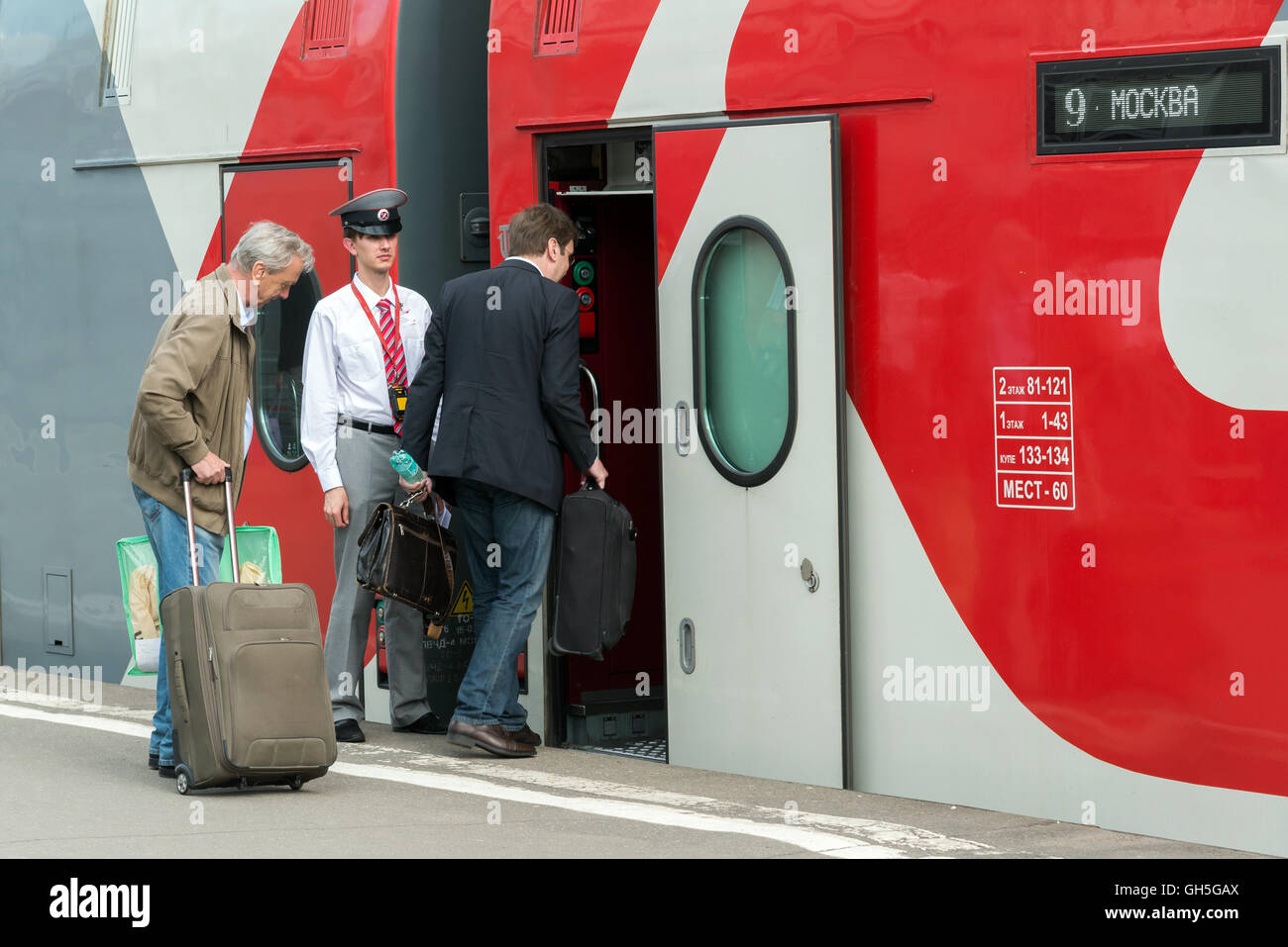 Moscow, Russia - June 14.2016. Passengers enter in two-storey train ...