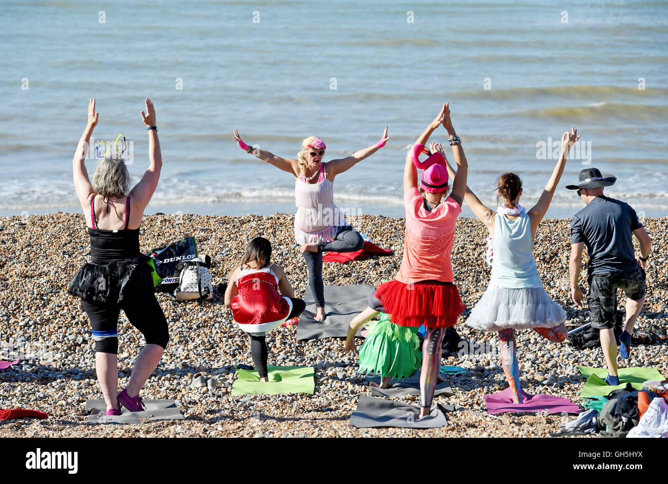 Yoga class on the beach hi-res stock photography and images - Alamy