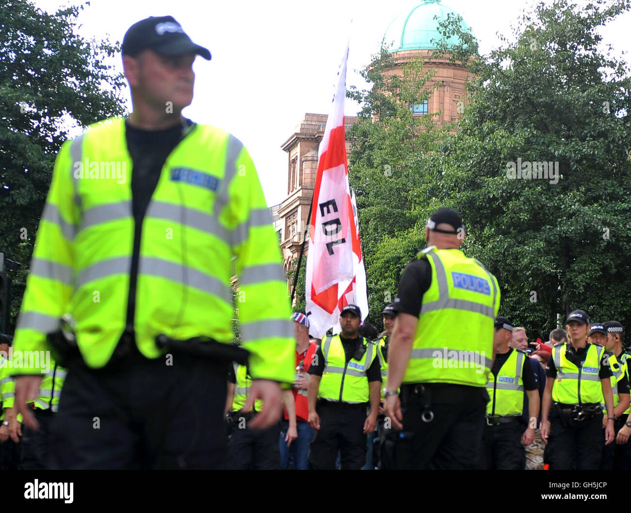 Protesters from the far-right group EDL (English Defence League) gather ...
