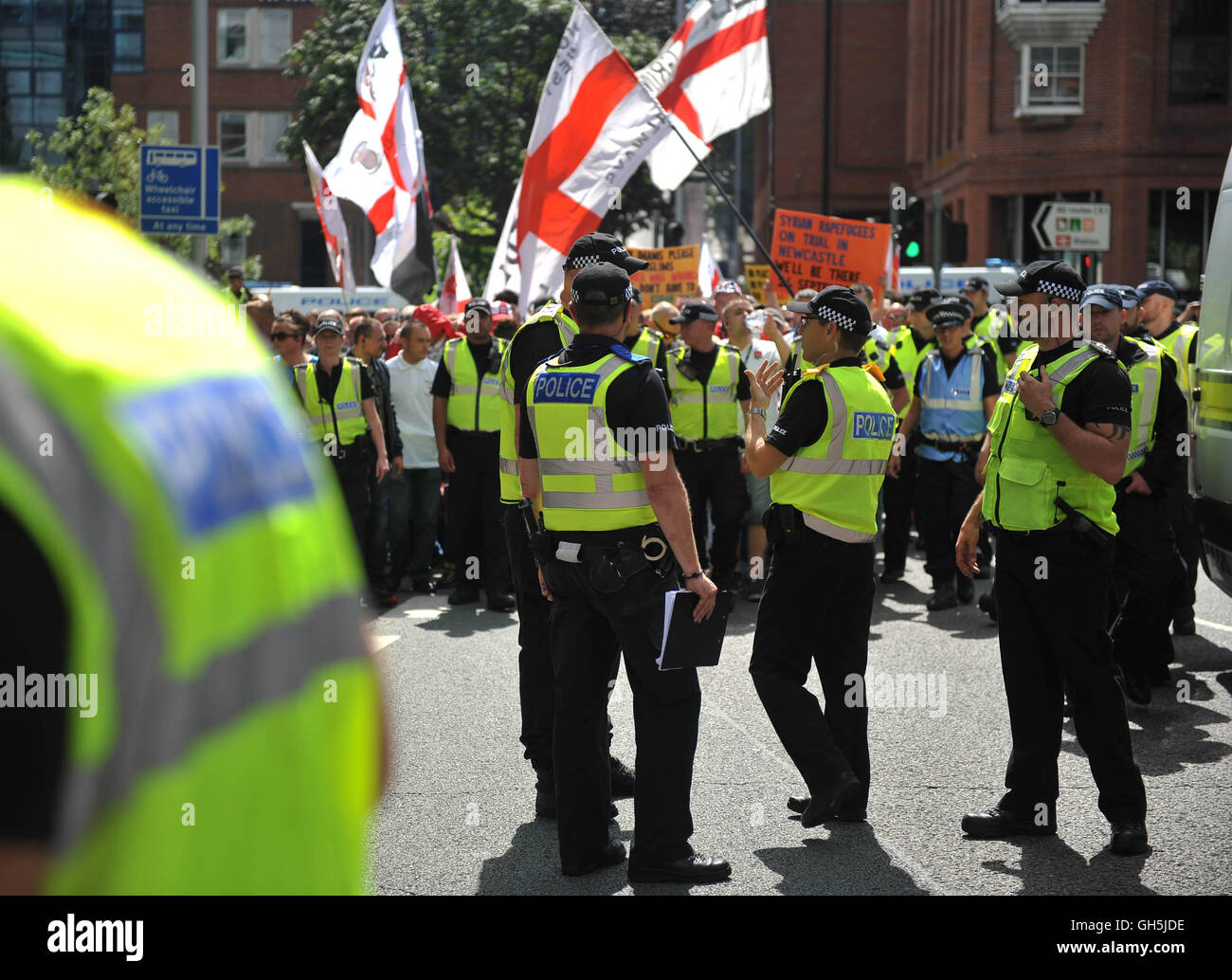 Protesters from the far-right group EDL (English Defence League) gather ...