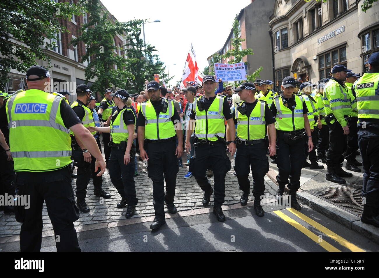 Protesters from the far-right group EDL (English Defence League) gather ...