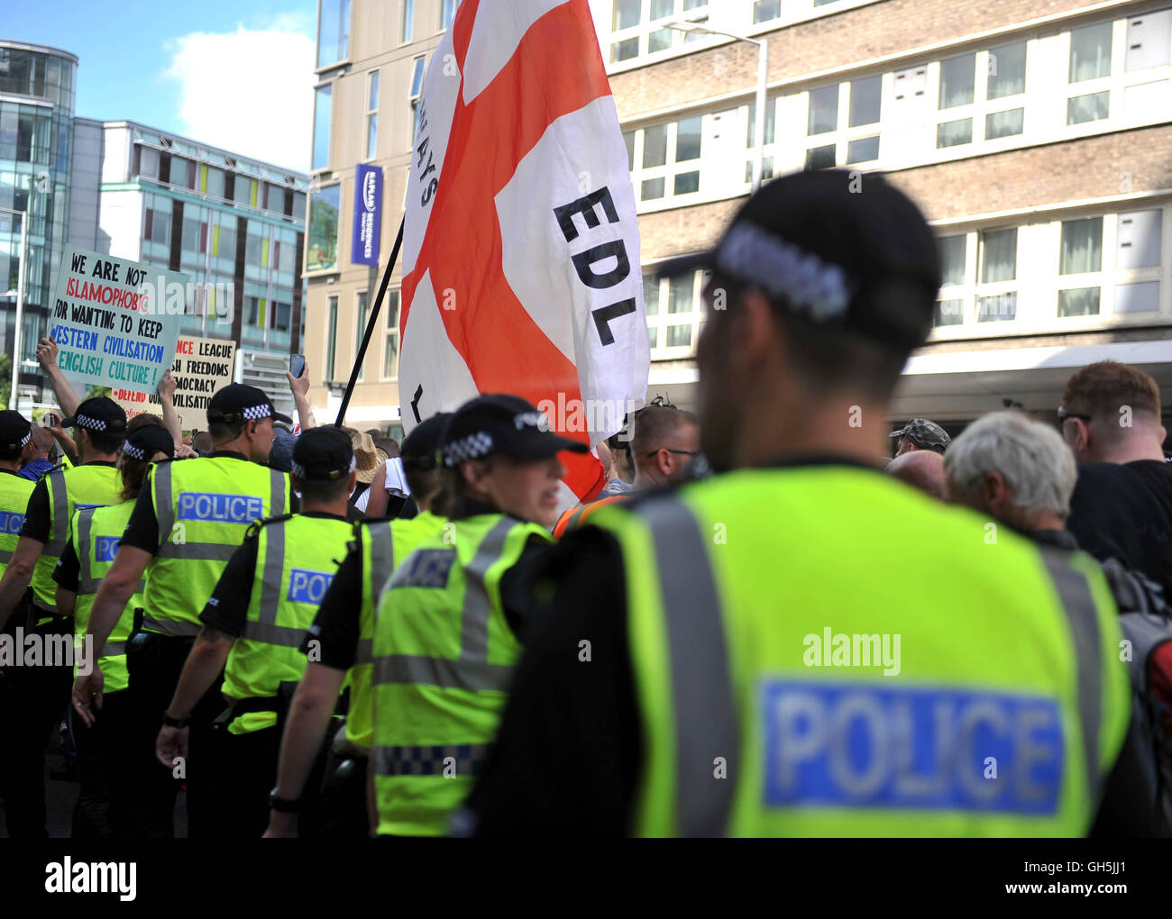 Protesters from the far-right group EDL (English Defence League) gather ...