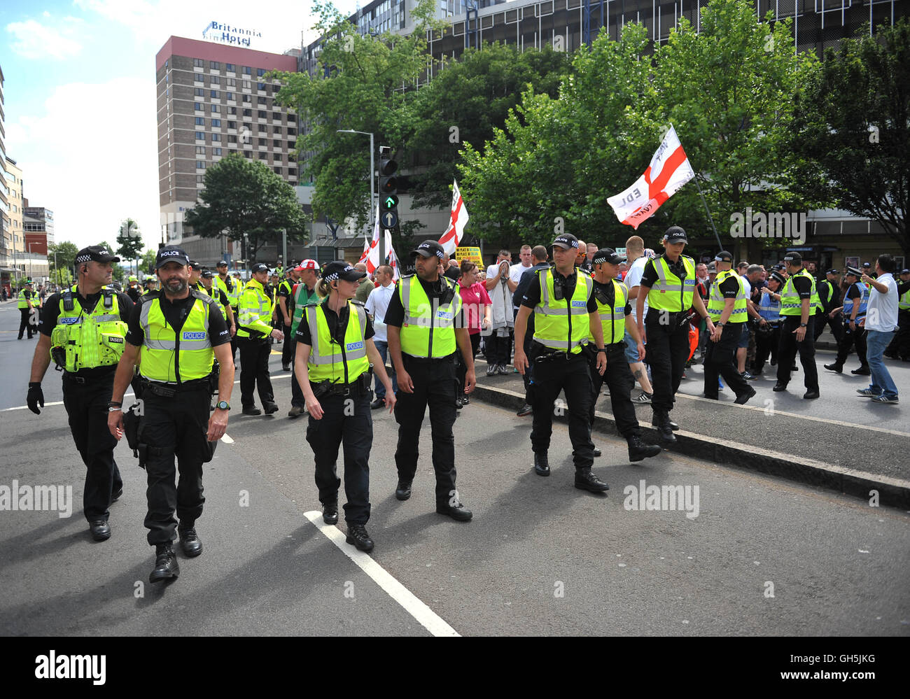 Protesters from the far-right group EDL (English Defence League) gather ...