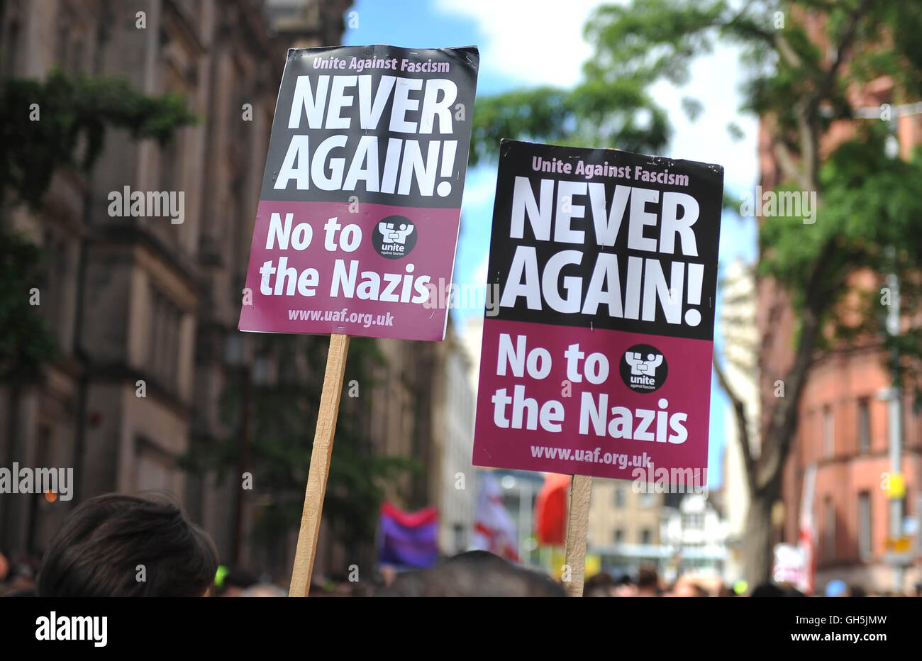 Members of the group Unite Against Fascism protest against the EDL ...