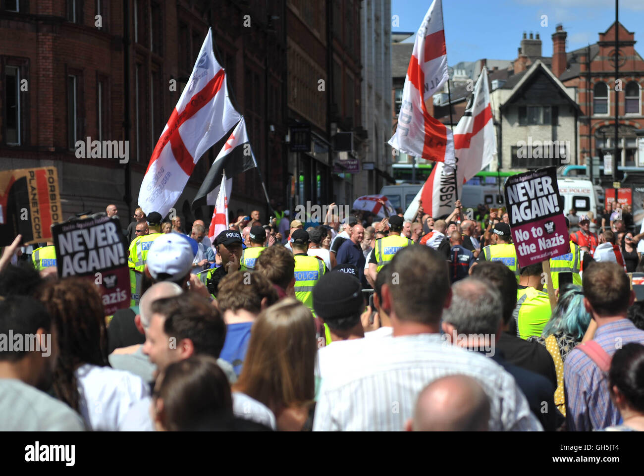 Members of the group Unite Against Fascism protest against the EDL ...