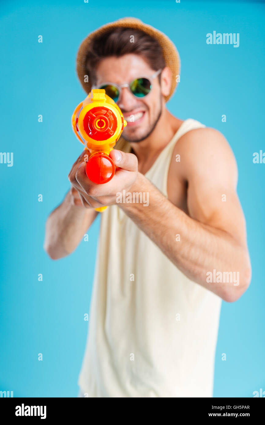 Handsome young brunette man playing hi-res stock photography and images ...