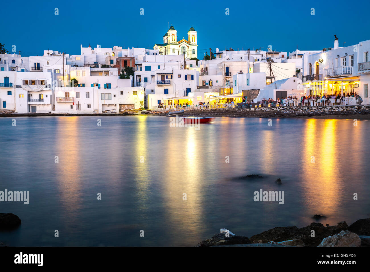 Sunset by the port of Naoussa, Paros island Stock Photo - Alamy
