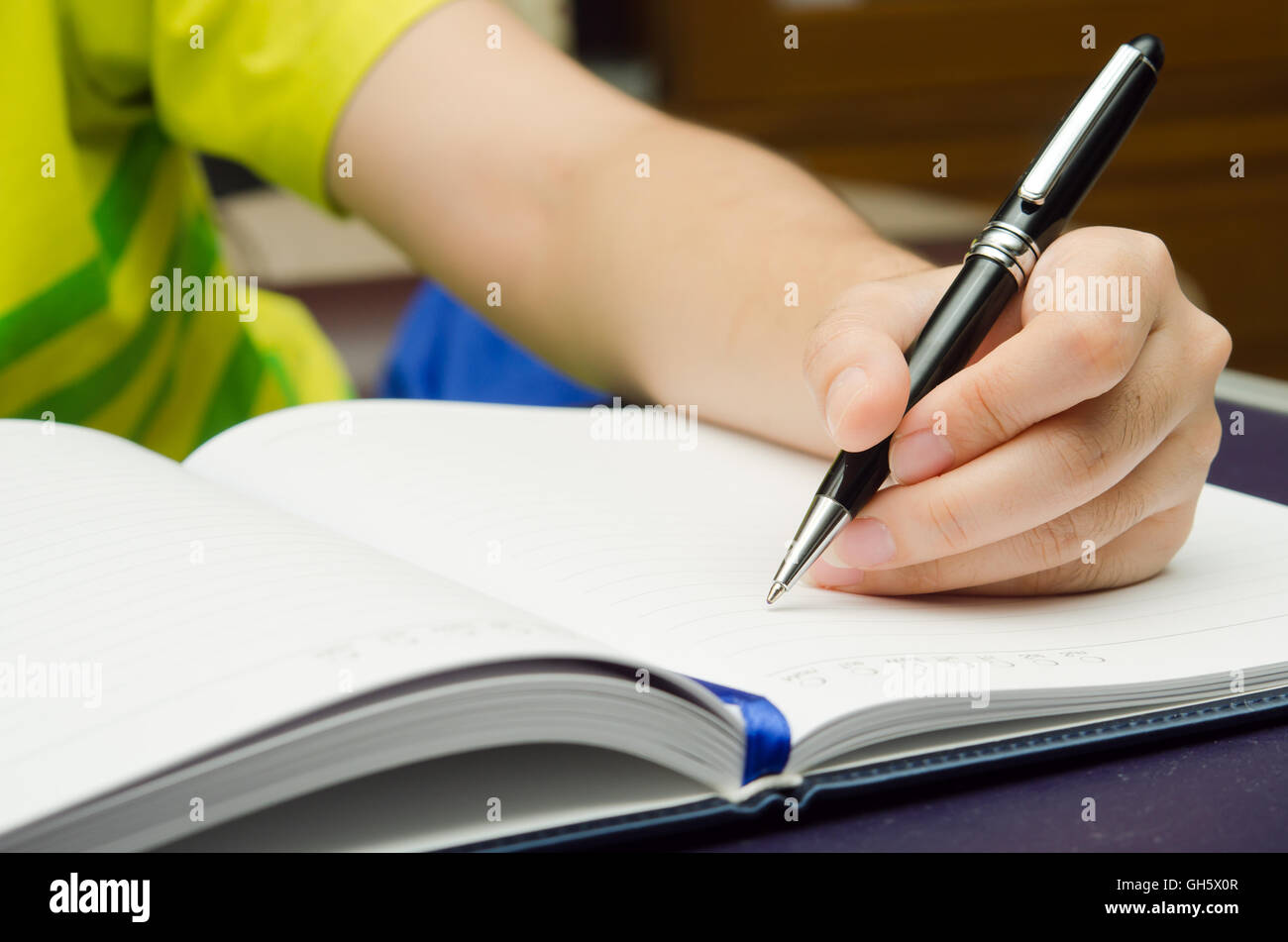 Pen hand text book hi-res stock photography and images - Alamy