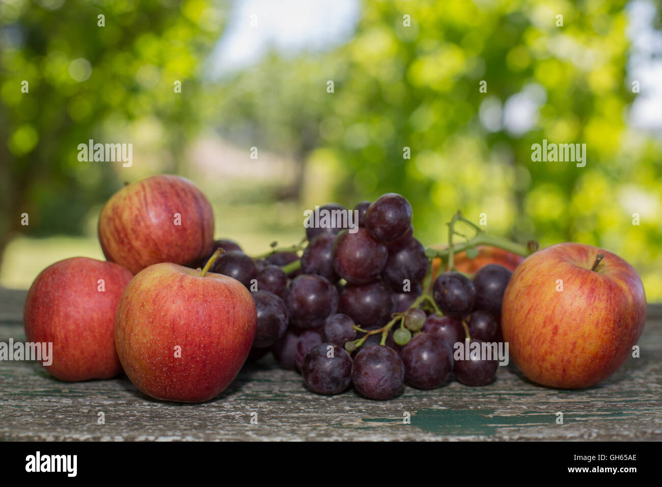 fruits in wooden table, outdoor Stock Photo - Alamy