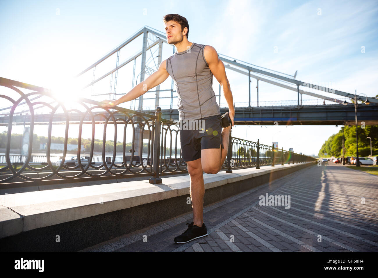 Young sports man doing hi-res stock photography and images - Alamy