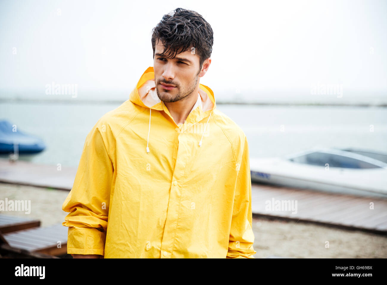Yellow cloak hi-res stock photography and images - Alamy