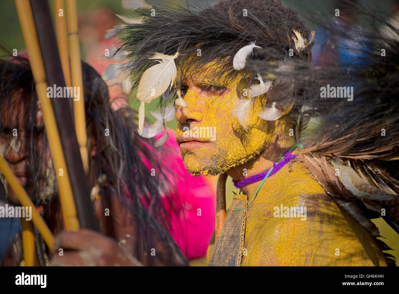 Yellow mud man Stock Photo - Alamy