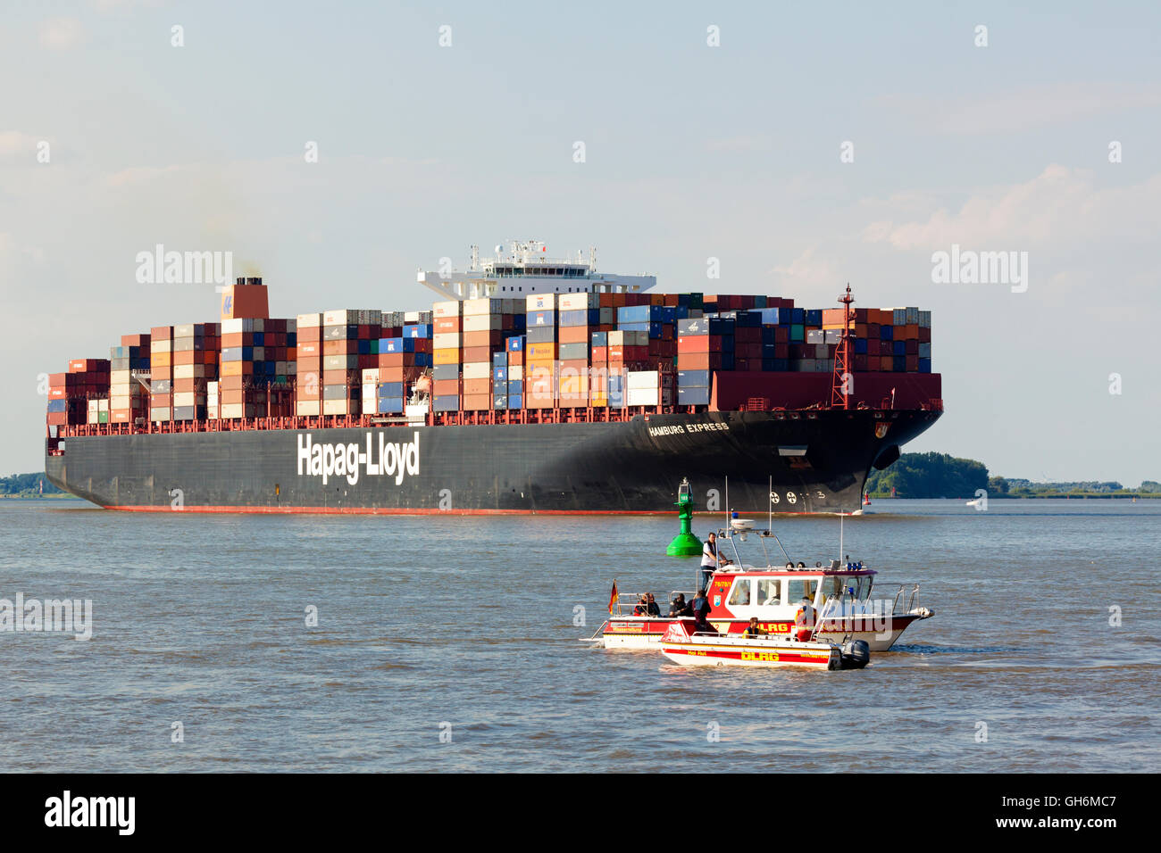 Container Ship HAMBURG EXPRESS Operated By Hapag Lloyd On The Elbe Container Ship HAMBURG EXPRESS Operated By Hapag Lloyd On The Elbe