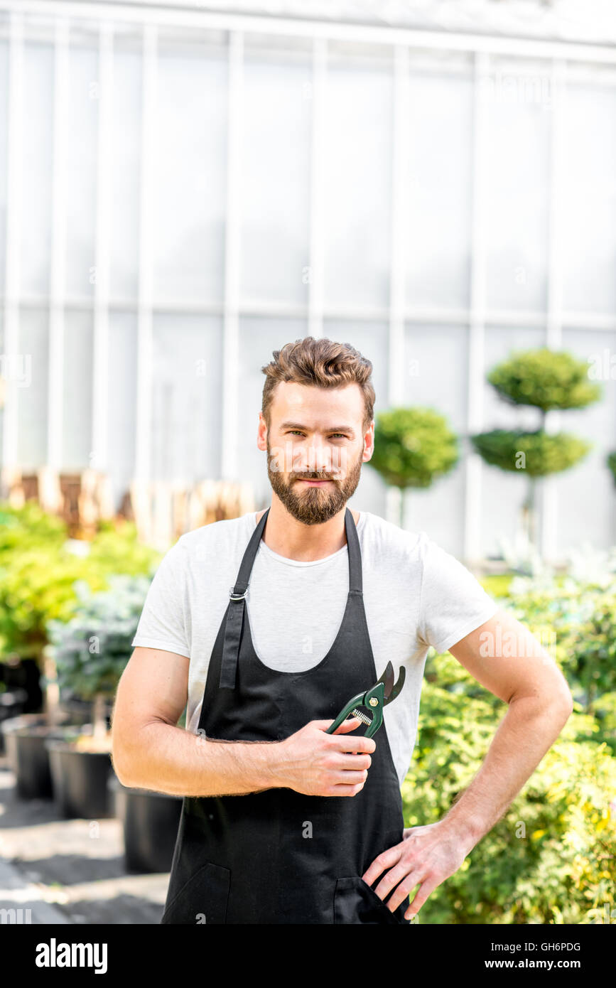 Portrait of a handsome gardener Stock Photo - Alamy
