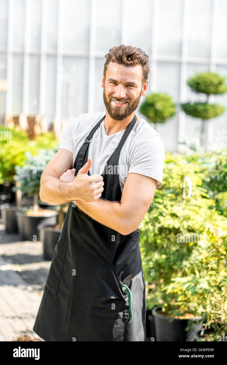 Portrait of a handsome gardener Stock Photo - Alamy