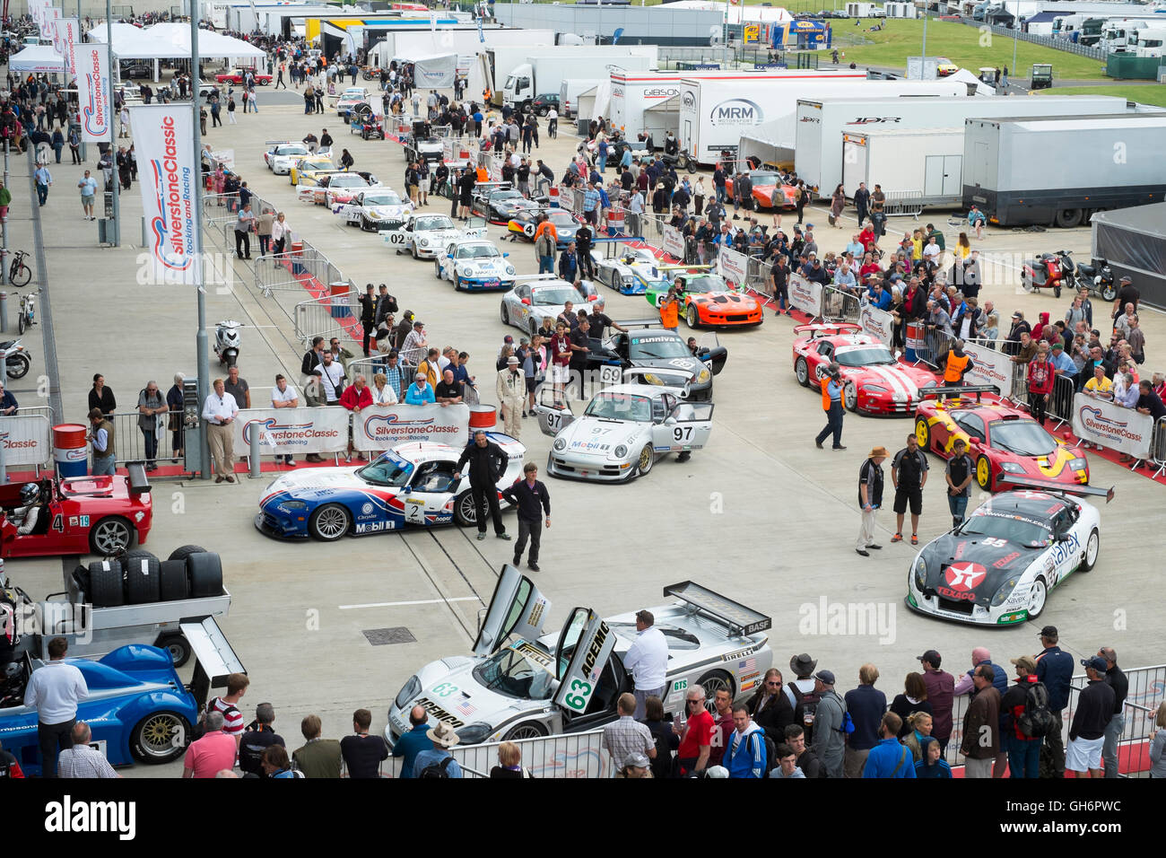 Sports racing cars lined up in the paddock at the annual Silverstone ...