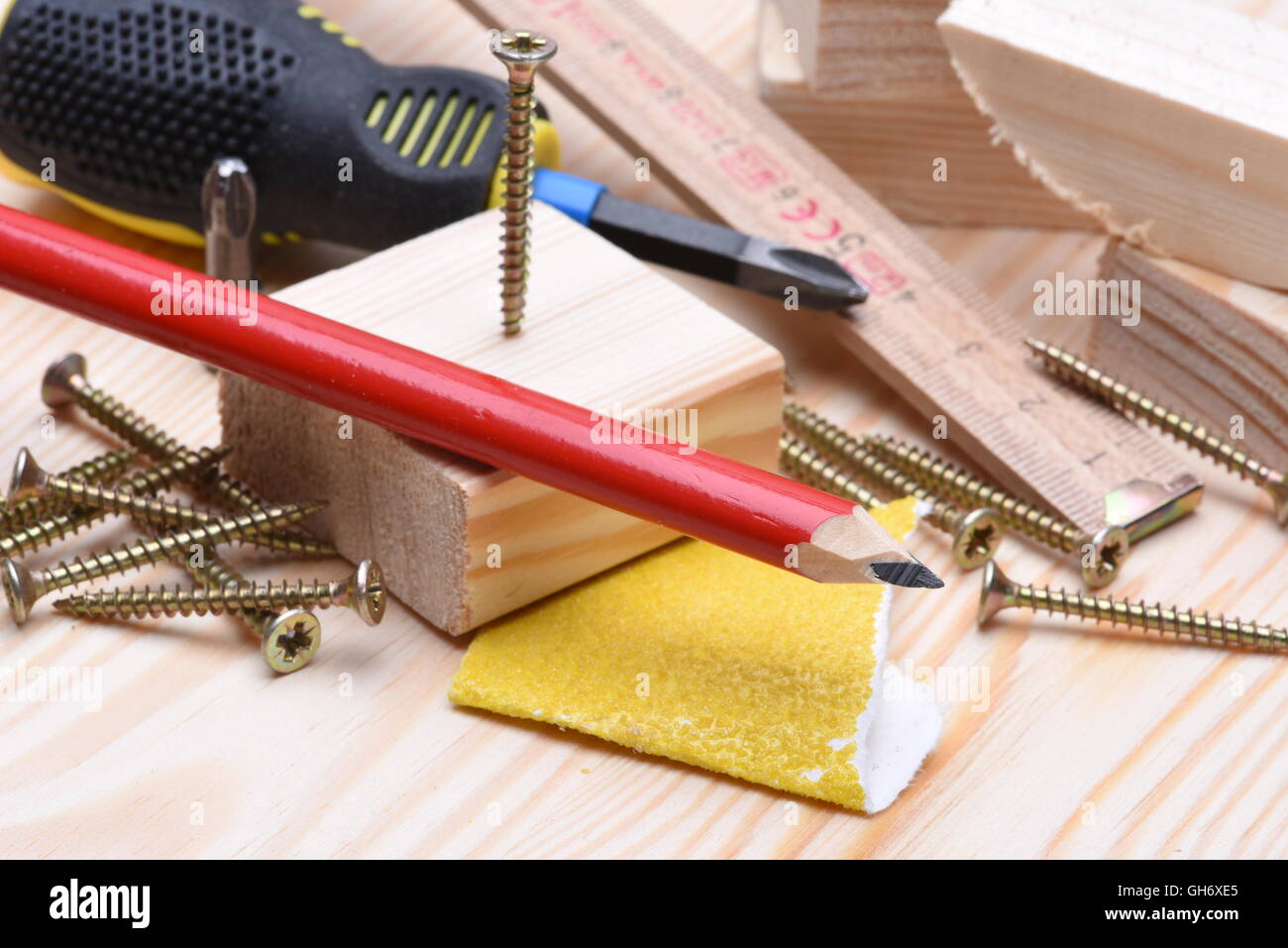 Set of working tools on wooden board Stock Photo - Alamy