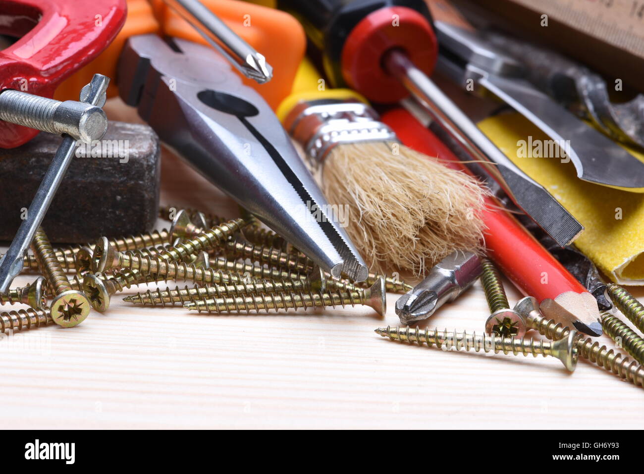 Set of working tools on wooden board Stock Photo - Alamy
