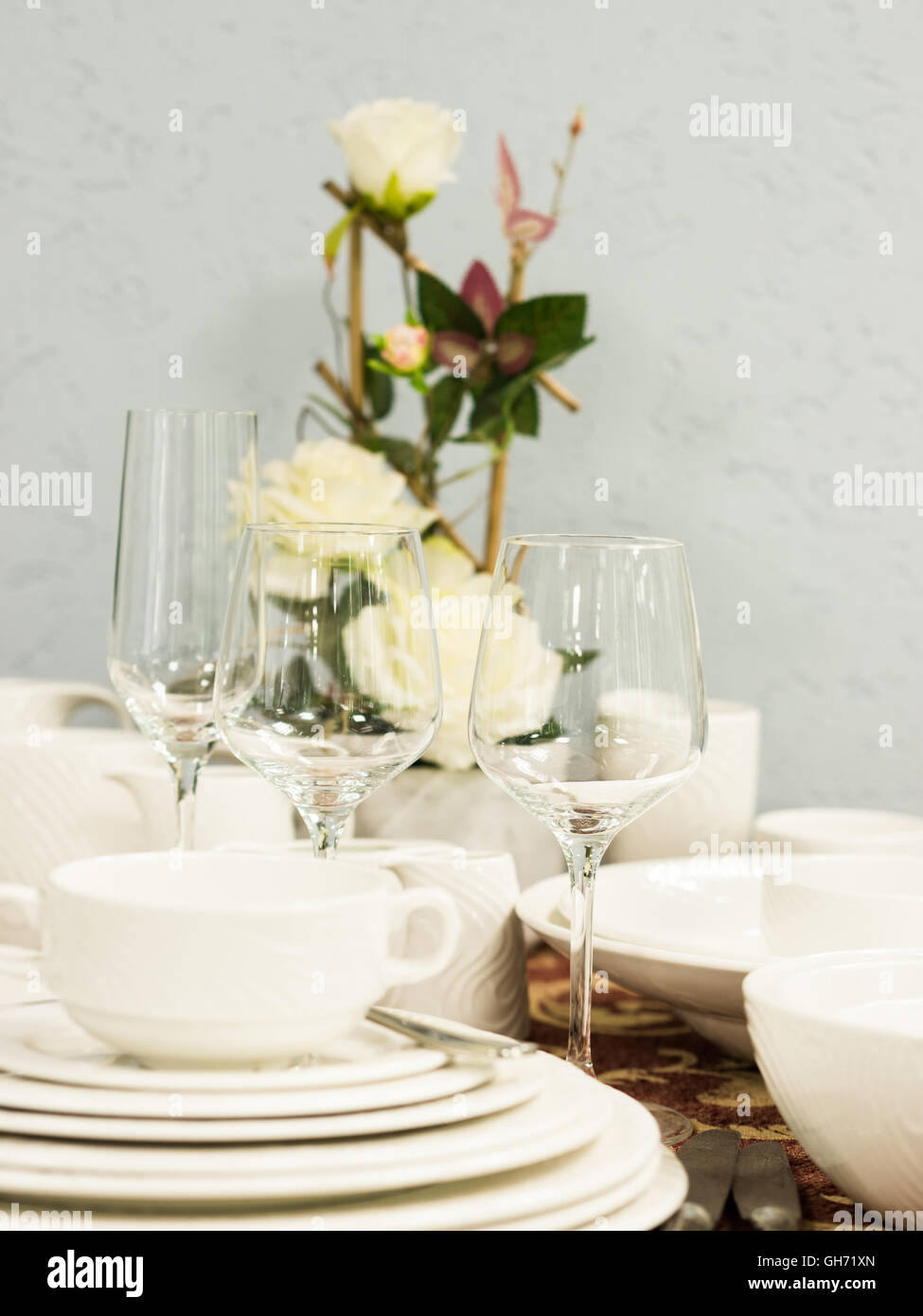 Set of dishes on table Stock Photo - Alamy