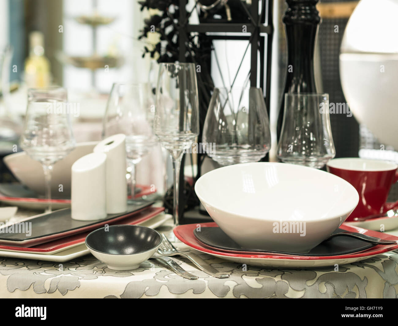 Set of dishes on table Stock Photo - Alamy