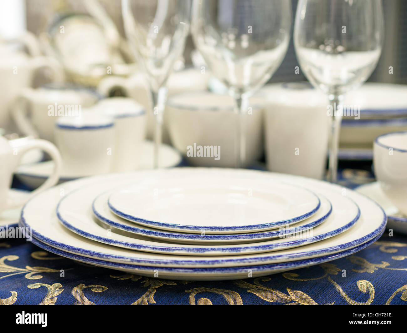 Set of dishes on table Stock Photo - Alamy