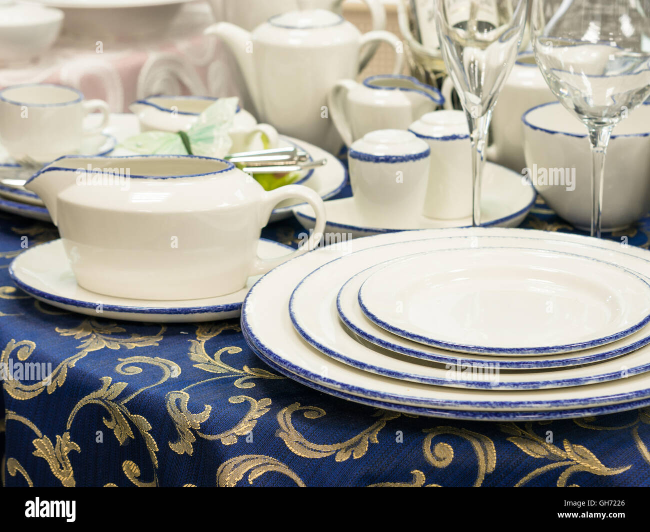 Set of dishes on table Stock Photo - Alamy