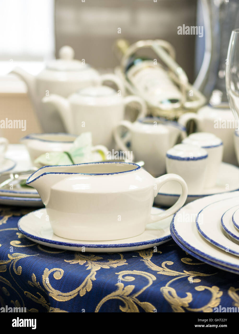Set of dishes on table Stock Photo - Alamy