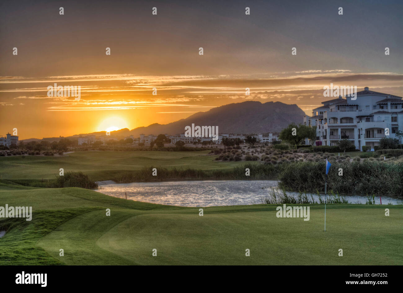 Hdr sun setting behind mountains hi-res stock photography and images ...