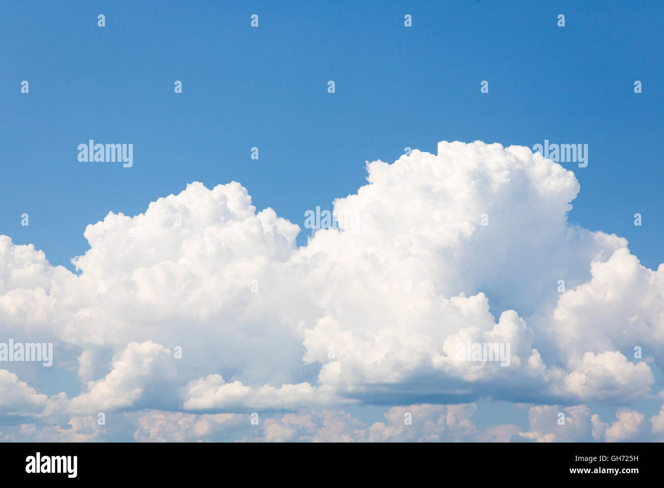 Real clouds and blue sky background Stock Photo - Alamy