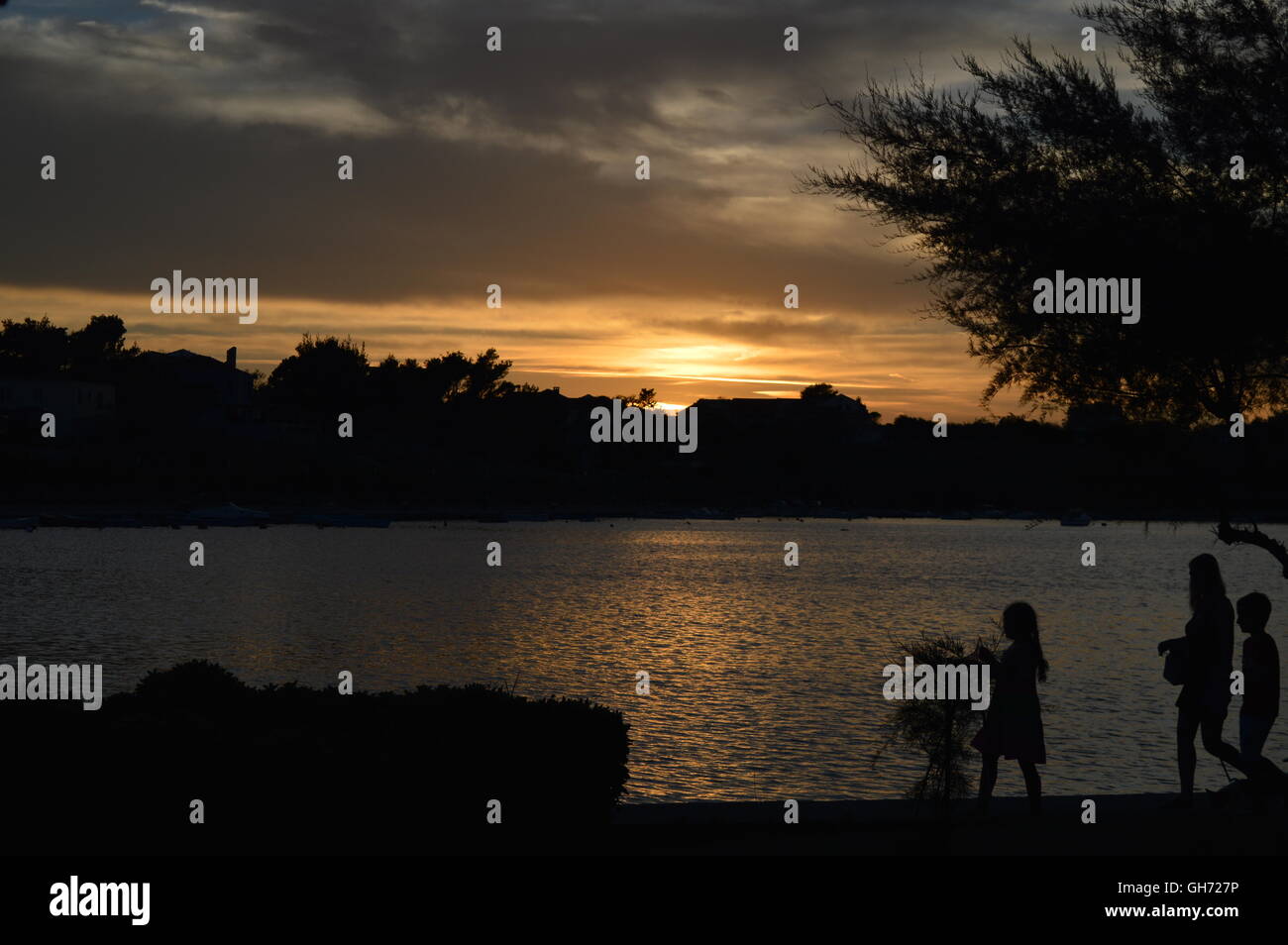 sunset at seafront Stock Photo - Alamy