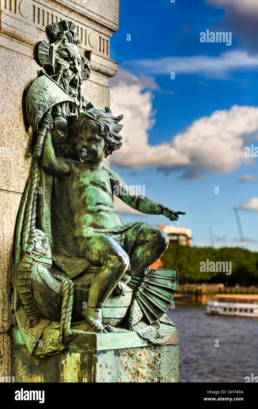 Statue boy with boat hi-res stock photography and images - Alamy