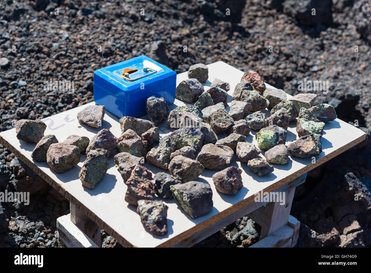 Table stall with blue till box on Canary Island with bizarre-shaped ...