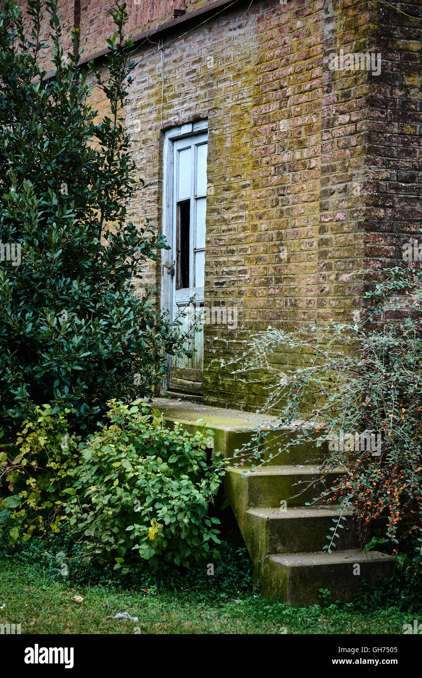 The back of an abandoned building near the train station in Gouin ...