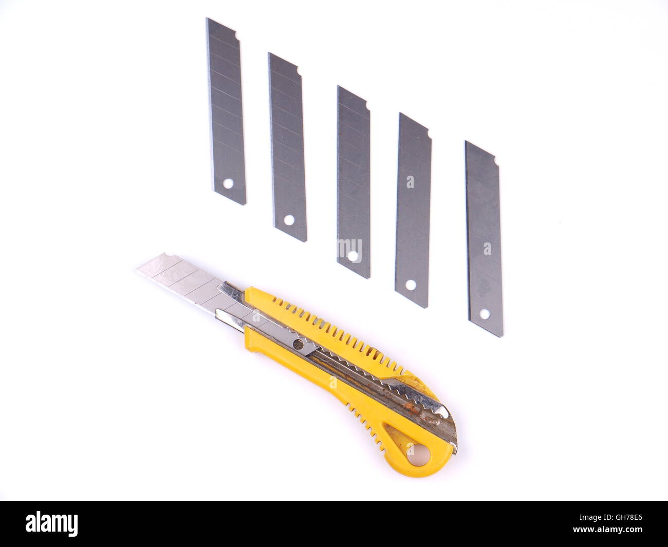 paper cutter on a white background Stock Photo - Alamy