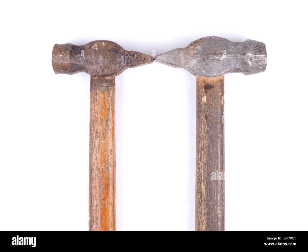 two old hammer on a white background Stock Photo - Alamy