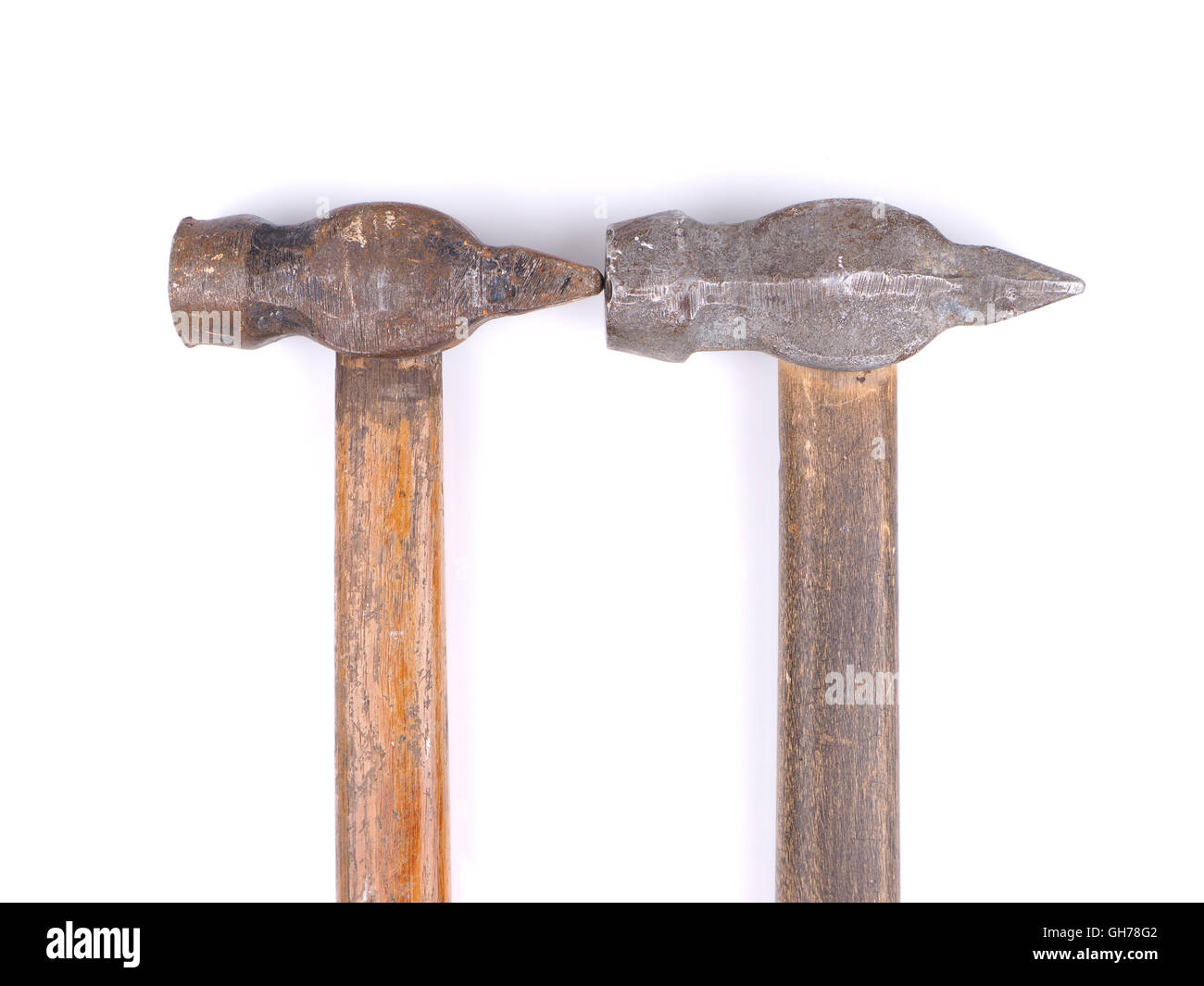two old hammer on a white background Stock Photo - Alamy